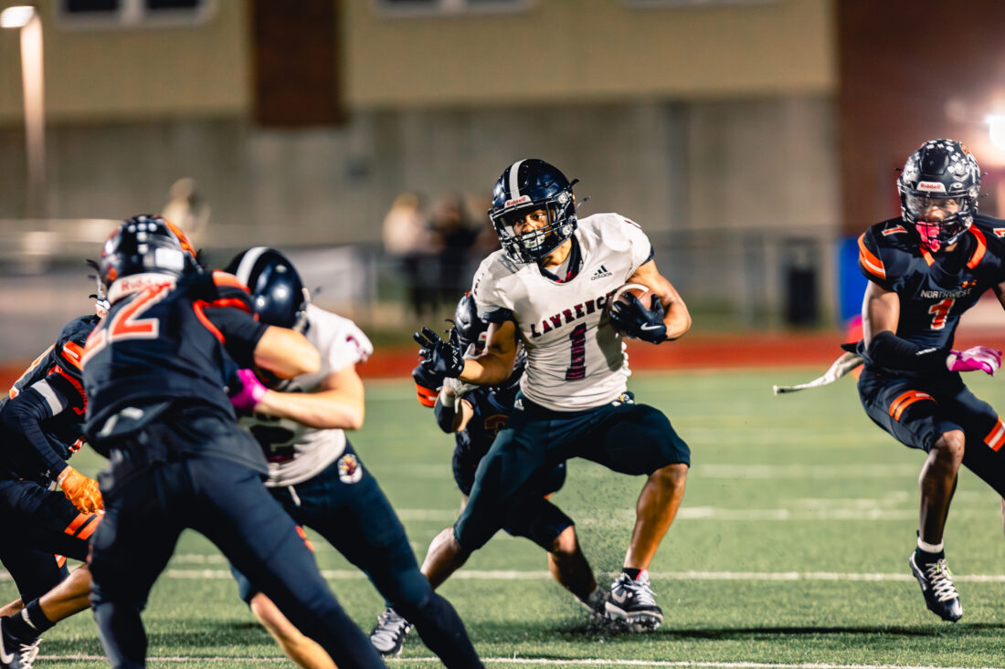 Lawrence football loses 26-7 to Shawnee Mission Northwest as penalties ...